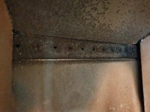 What A Baffle Plate Is In Wood Burning Stoves (And What It Does)